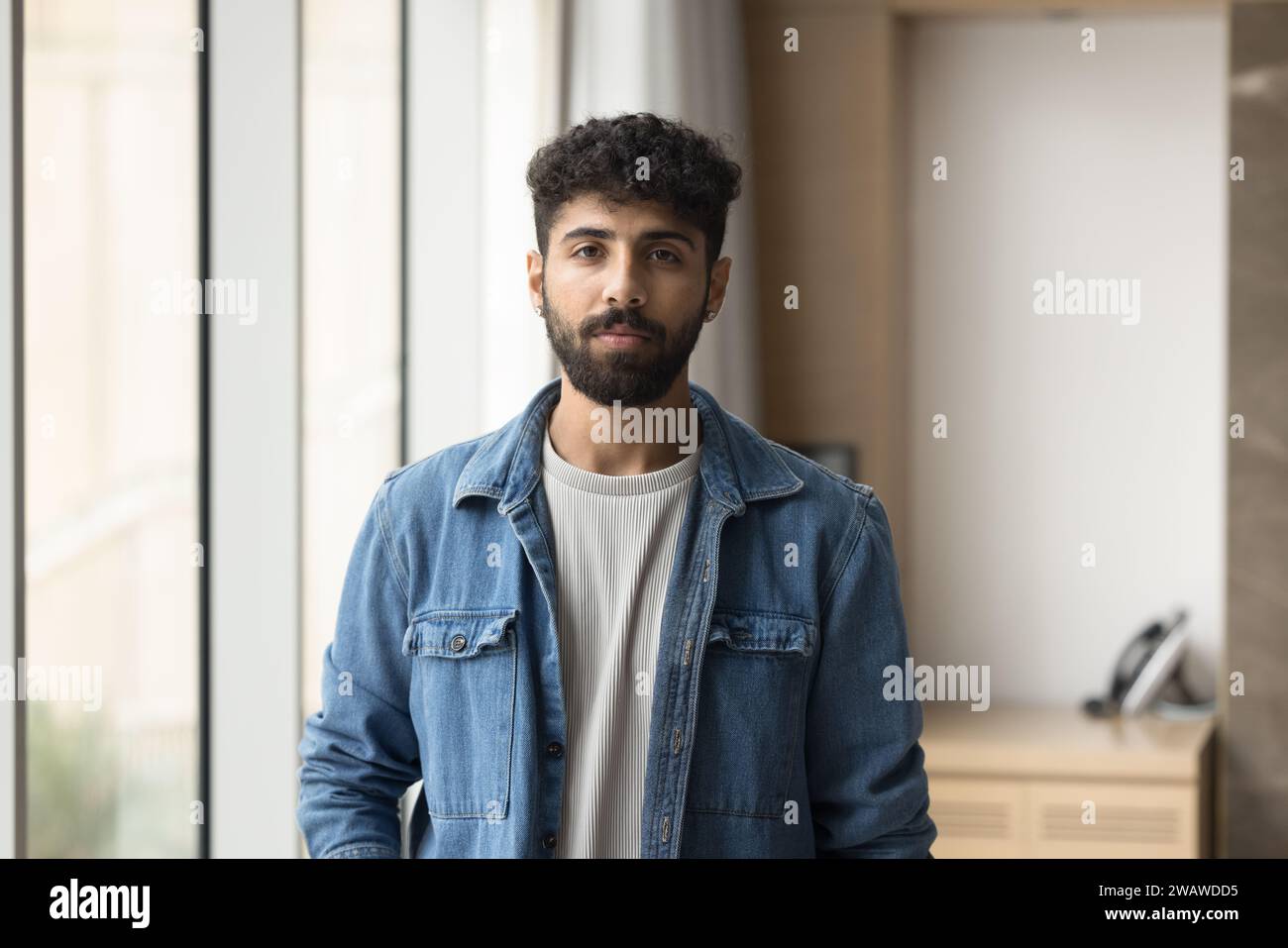 Serious handsome business company owner posing in office Stock Photo ...