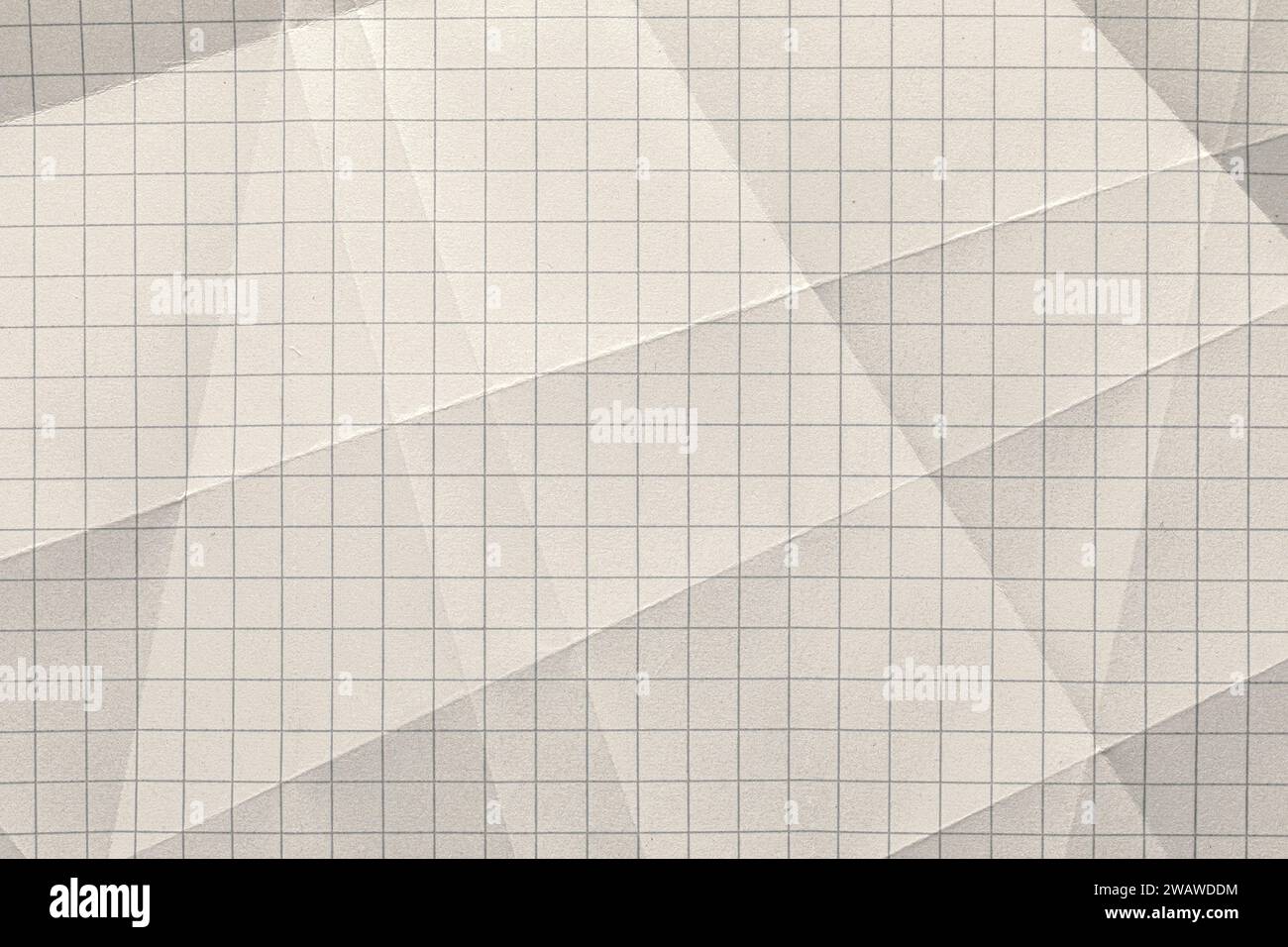 Close-up of graph ruled composition or exercise book paper with rough ...