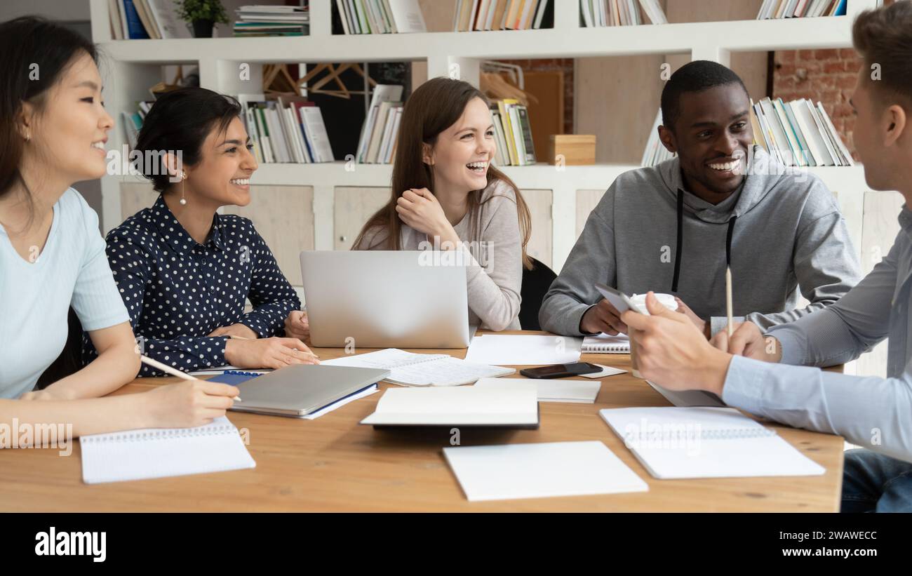 Happy multiethnic students have fun studying indoors together Stock ...