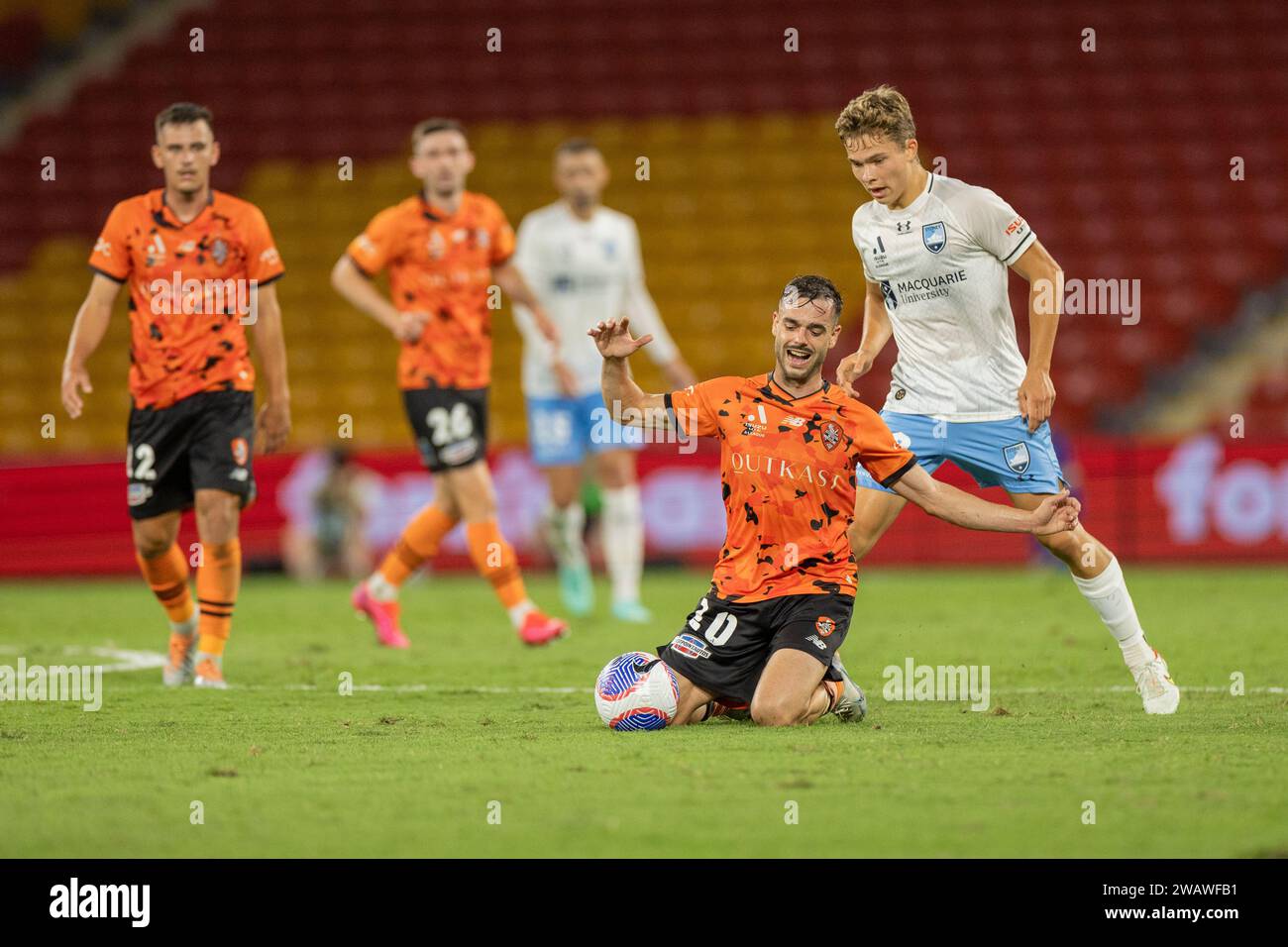 Brisbane, Australia. 6th Jan 2024. Corey Hollman (12 Sydney FC) tackled ...