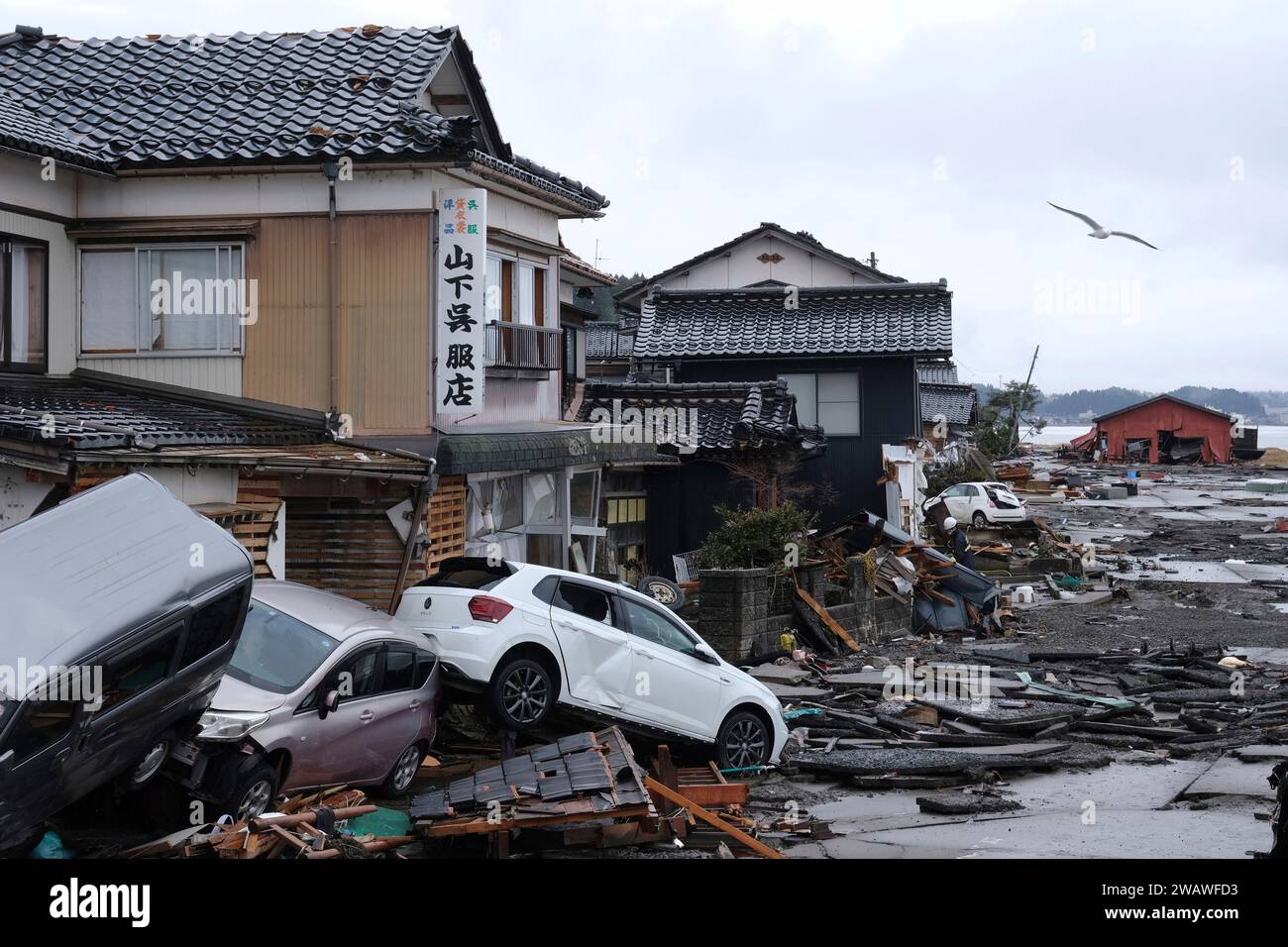 A photo shows a townscape damaged by massive earthquakes and tsunami in ...