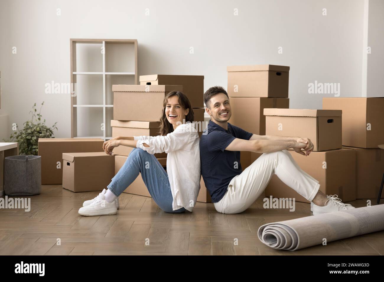 Happy couple beginning living together in new flat Stock Photo - Alamy