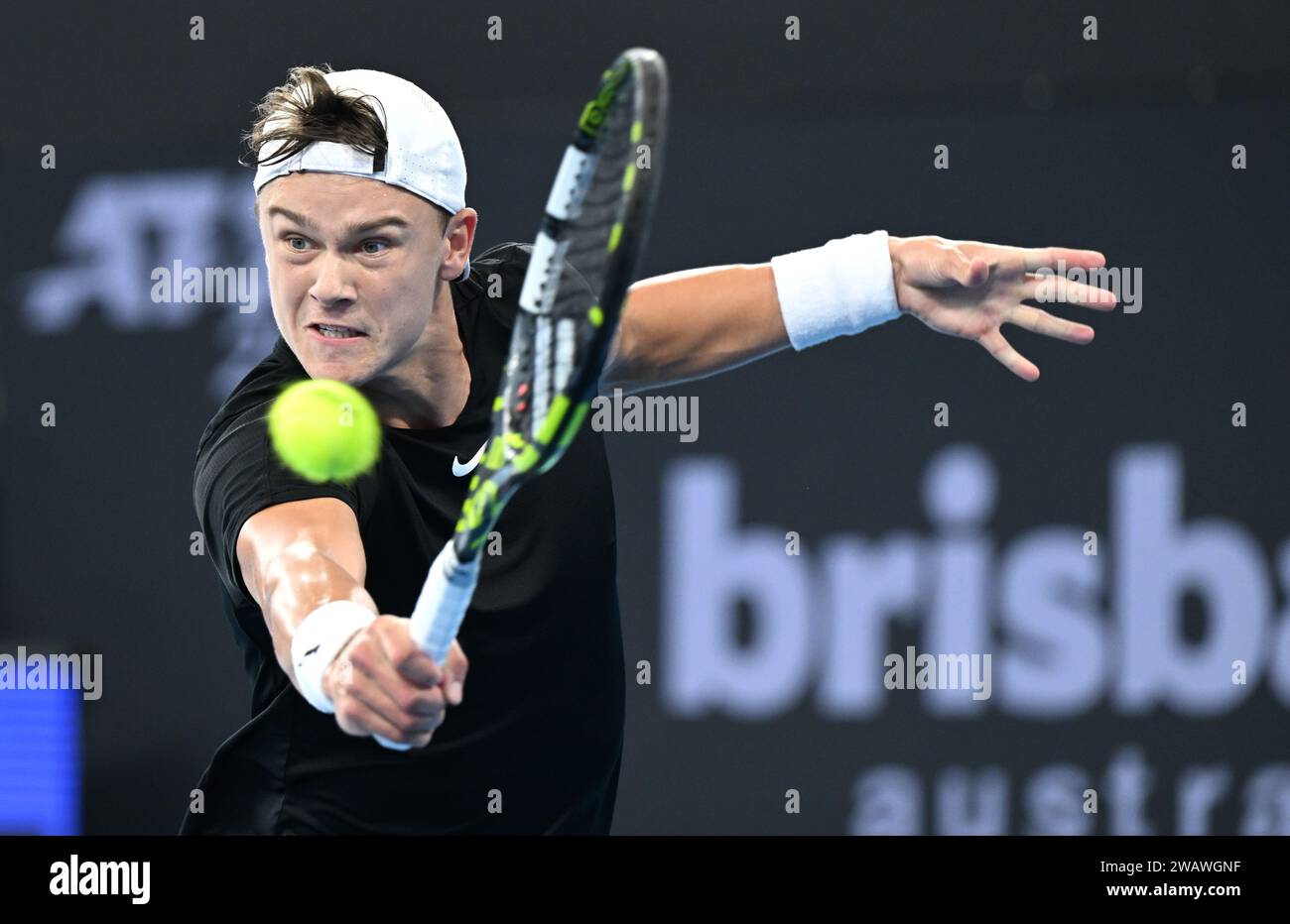 Brisbane, Australia. 07th Jan, 2024. Holger Rune of Denmark in action against Grigor Dimitrov of ...