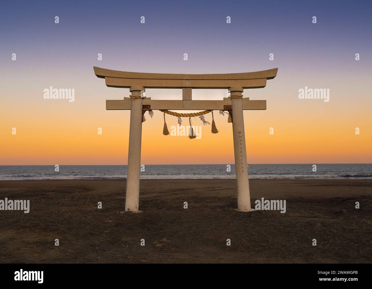 Torii on the beach in Japan at sunset Stock Photo - Alamy