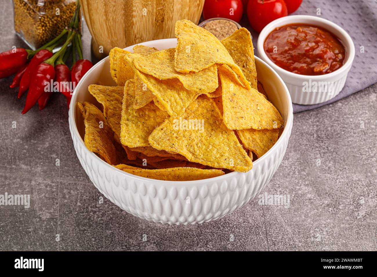 Mexican corn nachos chips with salsa dip Stock Photo - Alamy