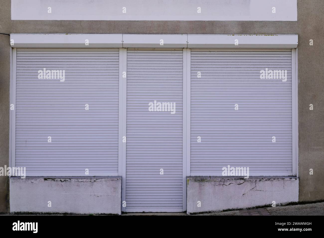 Factory entrance wall with fence hi-res stock photography and images ...