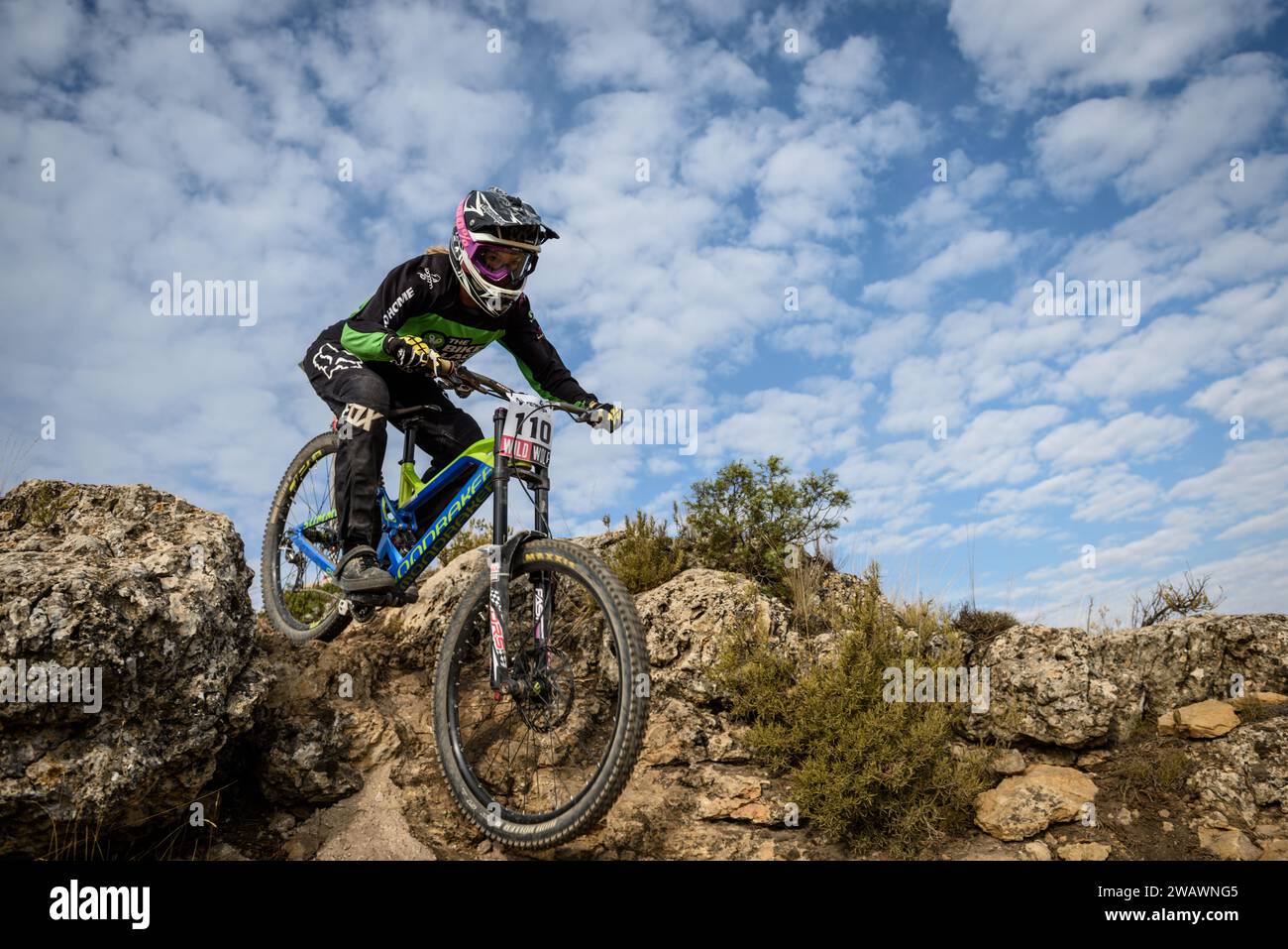 Cyclist on a MTB downhill mountain bike Stock Photo - Alamy
