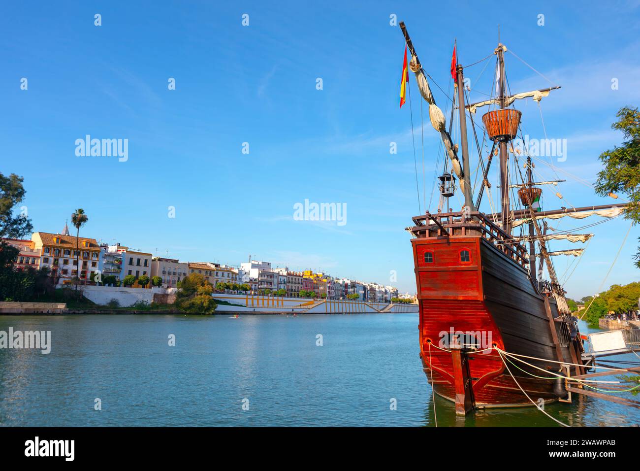 Historical wooden boat on the Guadalquivir river in Seville, Spain ...