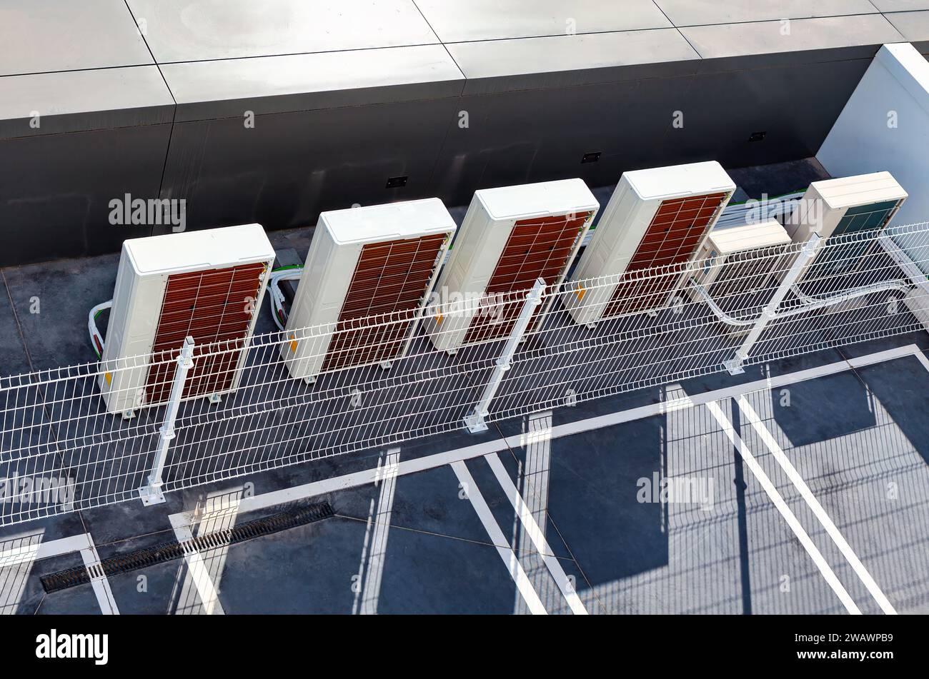 Air conditioner units on the roof of a modern office building Stock ...