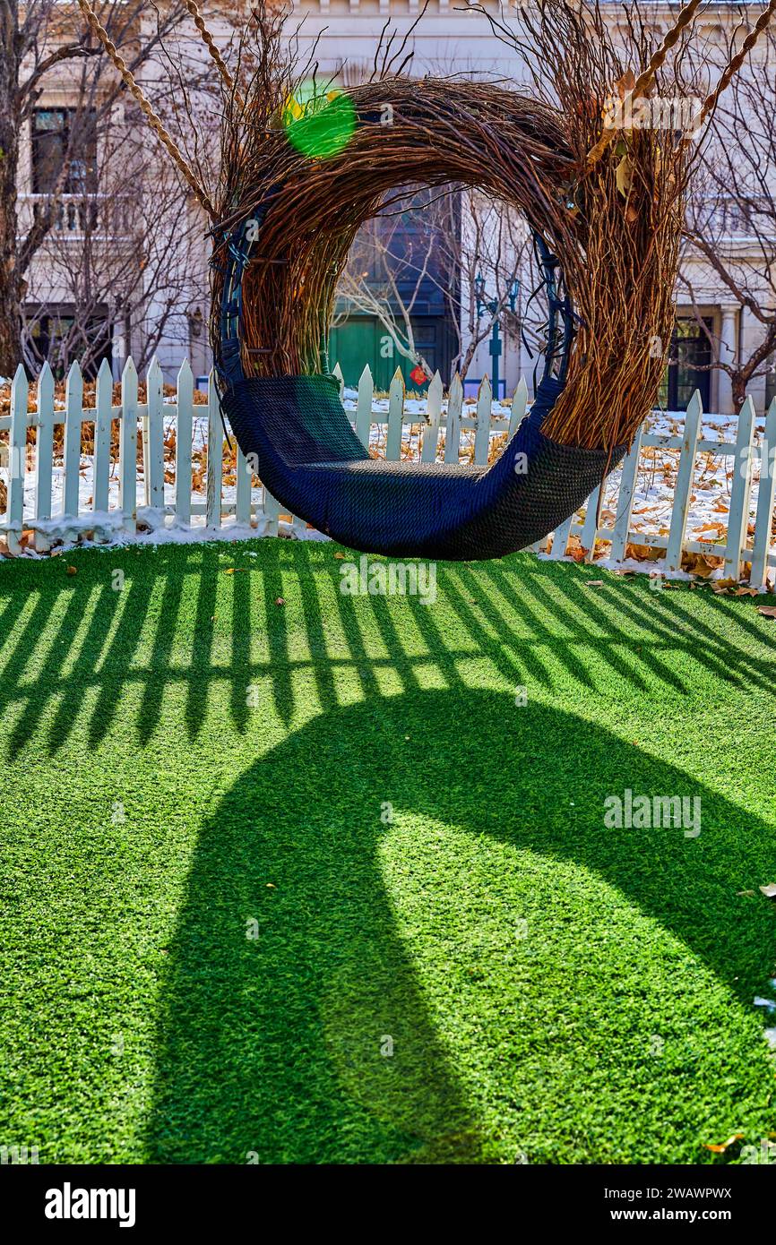 Round swing with strong shadow Stock Photo - Alamy