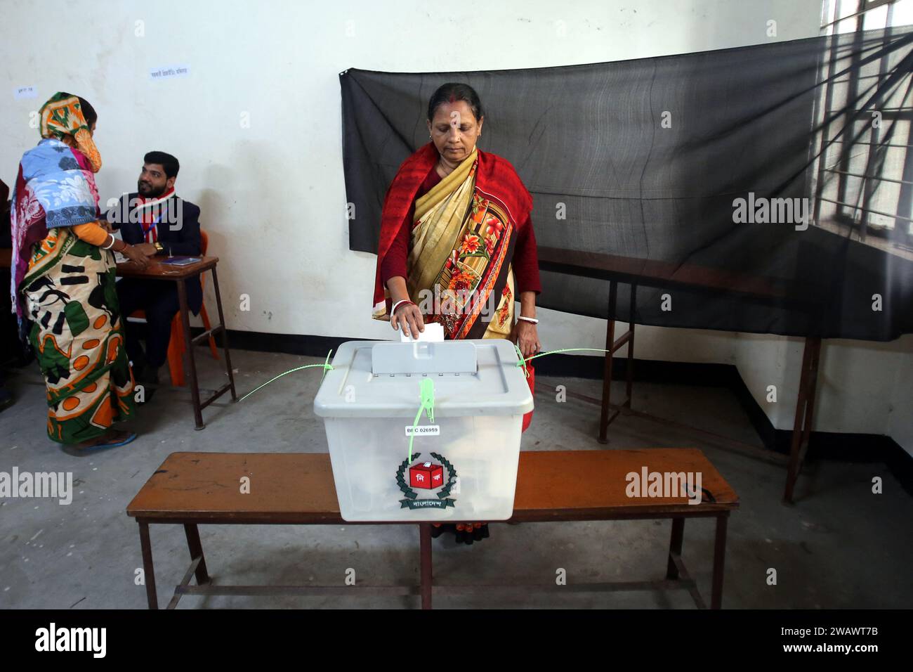 People casts her vote at a polling center during the 12th national ...