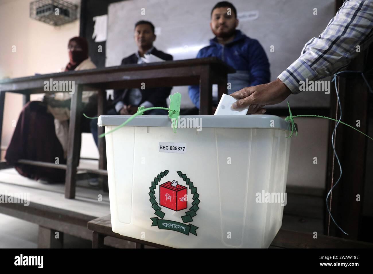 People casts her vote at a polling center during the 12th national ...