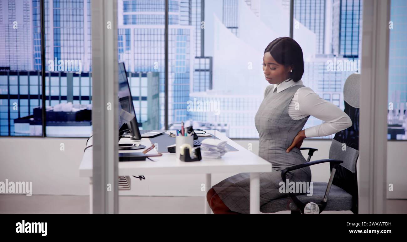 Preventing Bad Back Posture: Woman Overcoming Office Computer Injury ...