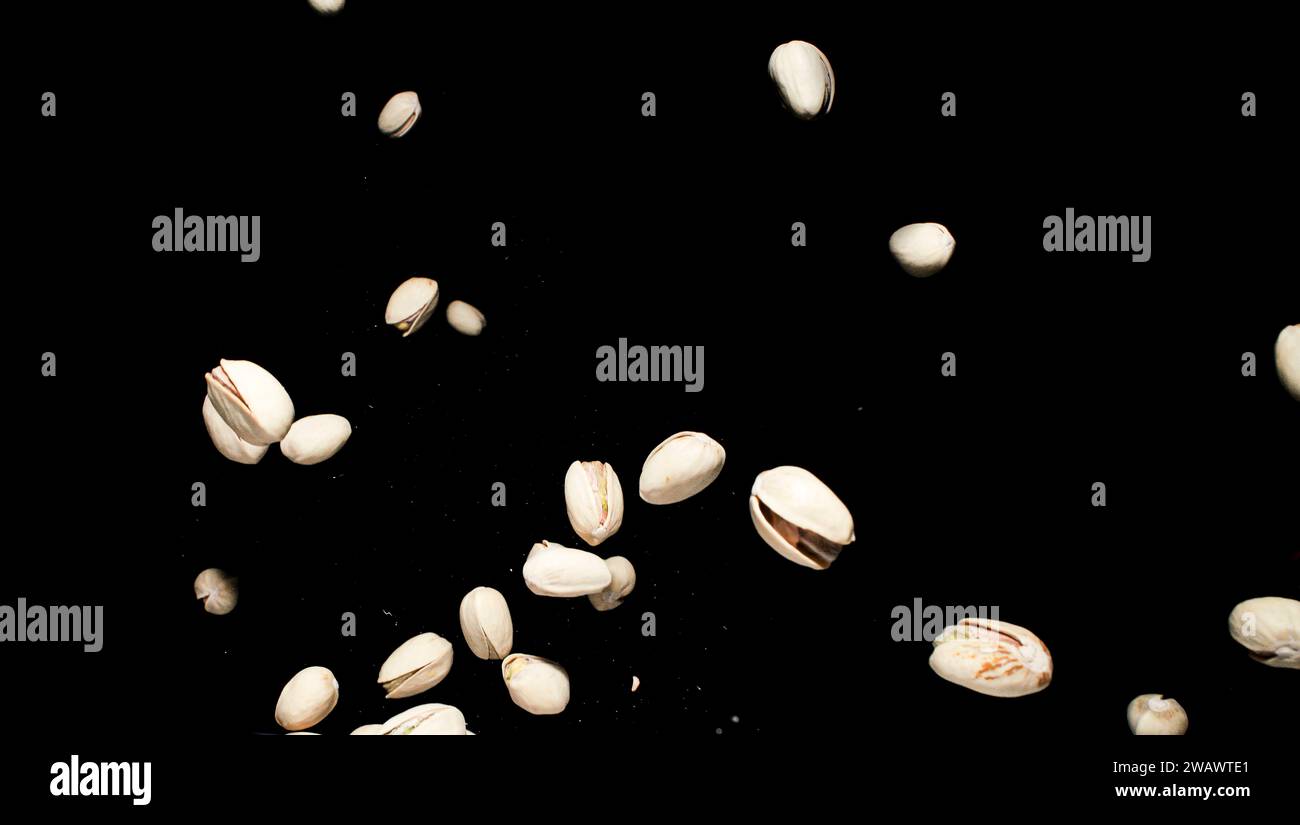 Nuts frozen in mid air hi-res stock photography and images - Alamy