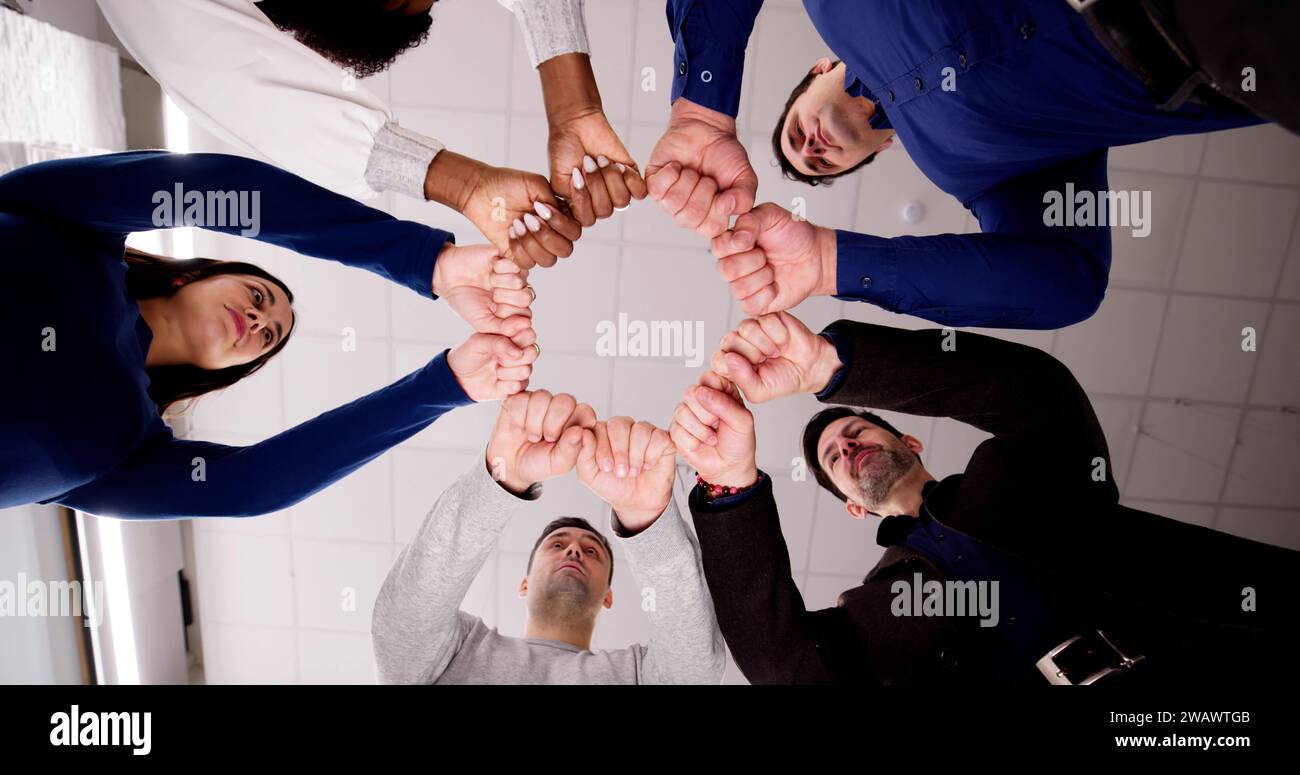 Fist bump hands teamwork hi-res stock photography and images - Alamy
