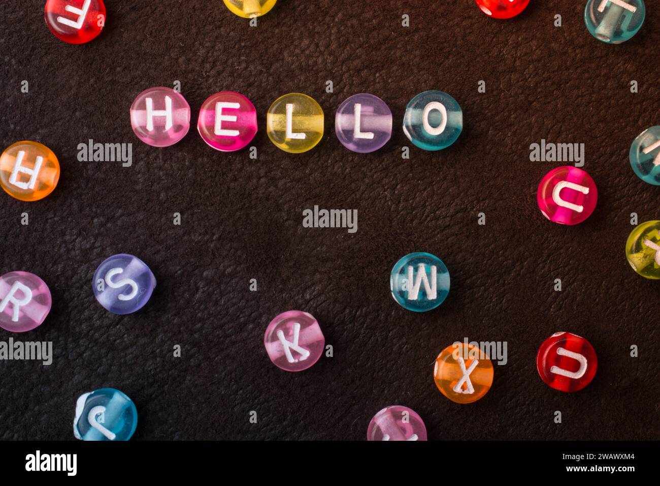 Hello wording formed with Multi color alphabet letter beads Stock Photo ...