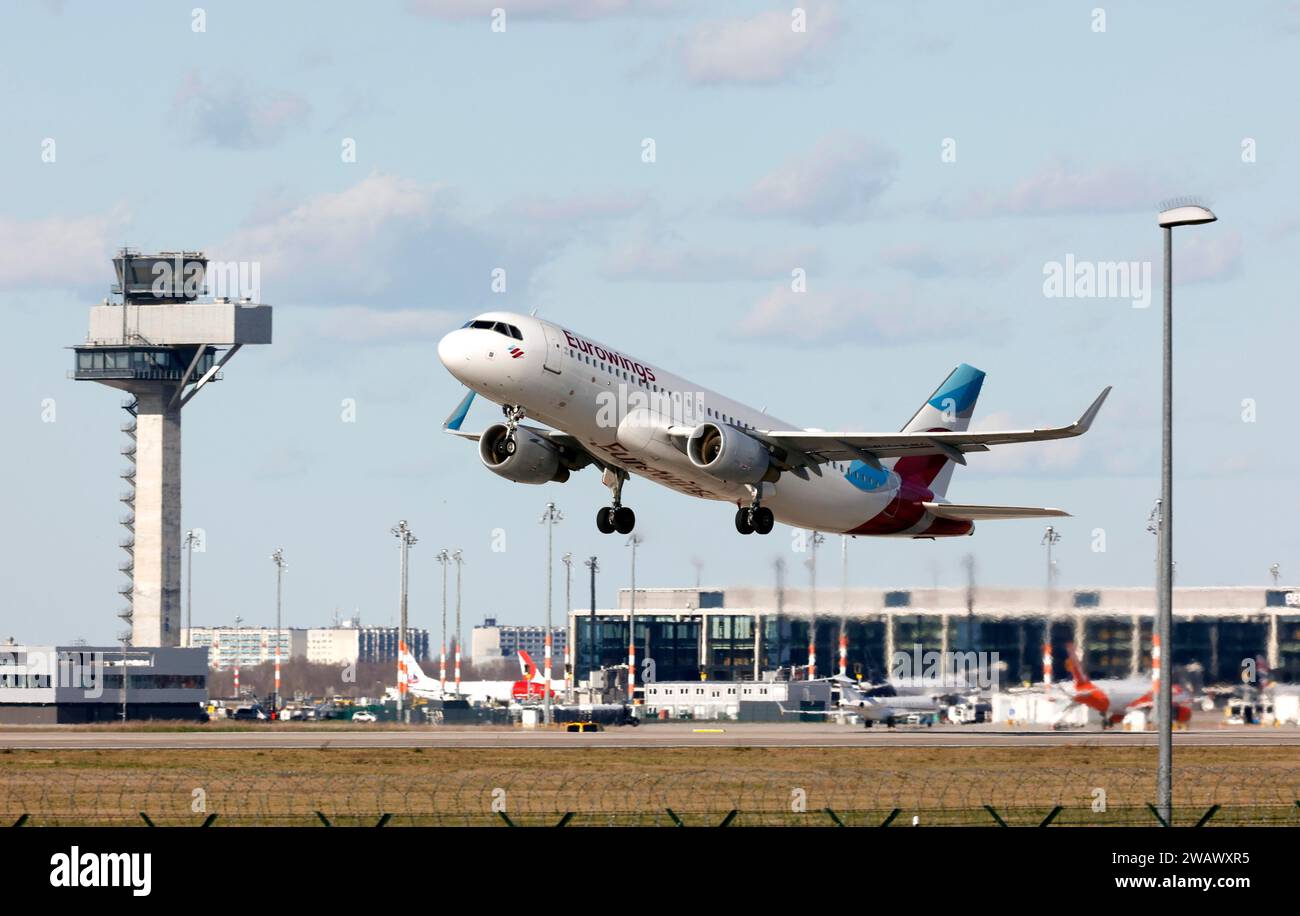 An Airbus A-320 of the airline Eurowings takes off at BER Berlin ...