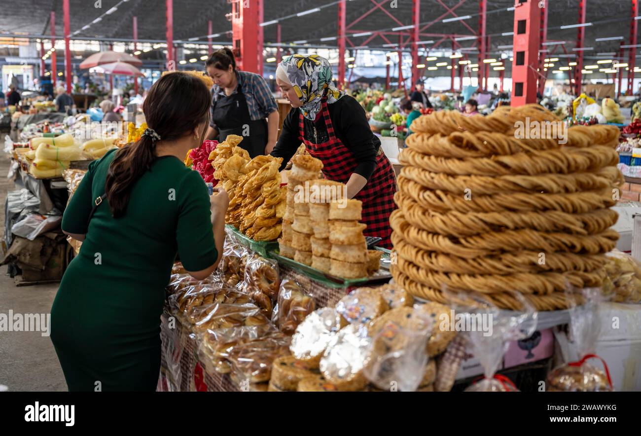 Vendor selling sweets, market stall at Osh Bazaar, Bishkek, Kyrgyzstan ...