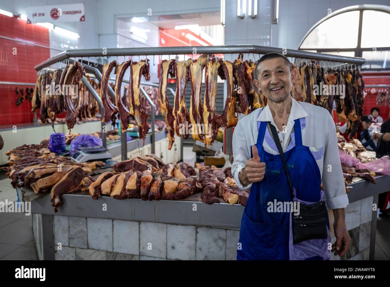 Butcher happy, fresh meat, market at Osh bazaar, Bishkek, Kyrgyzstan ...