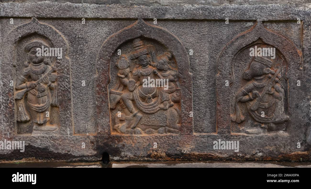 Carvings of Hindu Deities on the wall of Ancient Shri Madhukeshwara ...