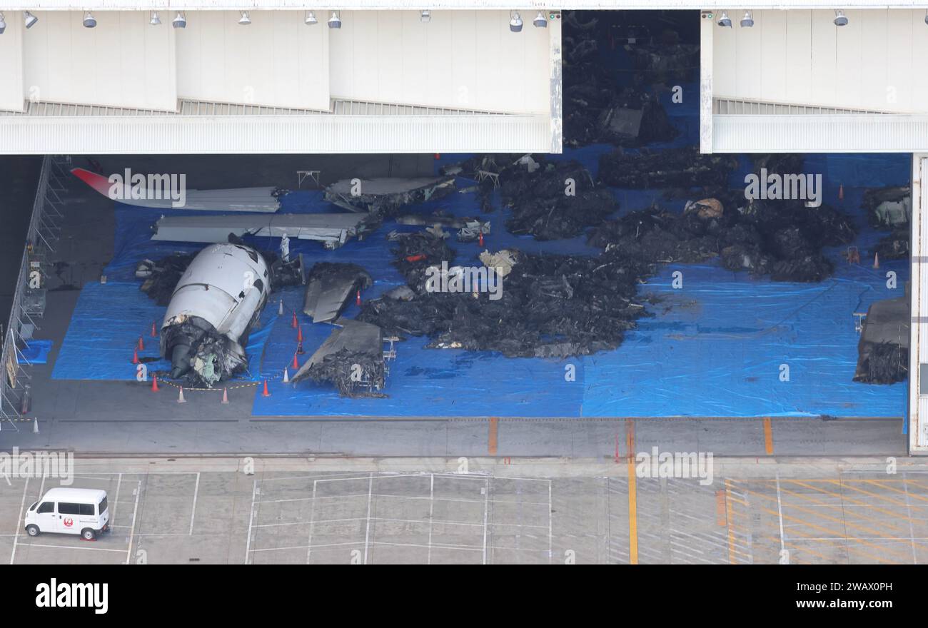 Debris of the Japan Airlines Flight 516, which was burnt after it ...