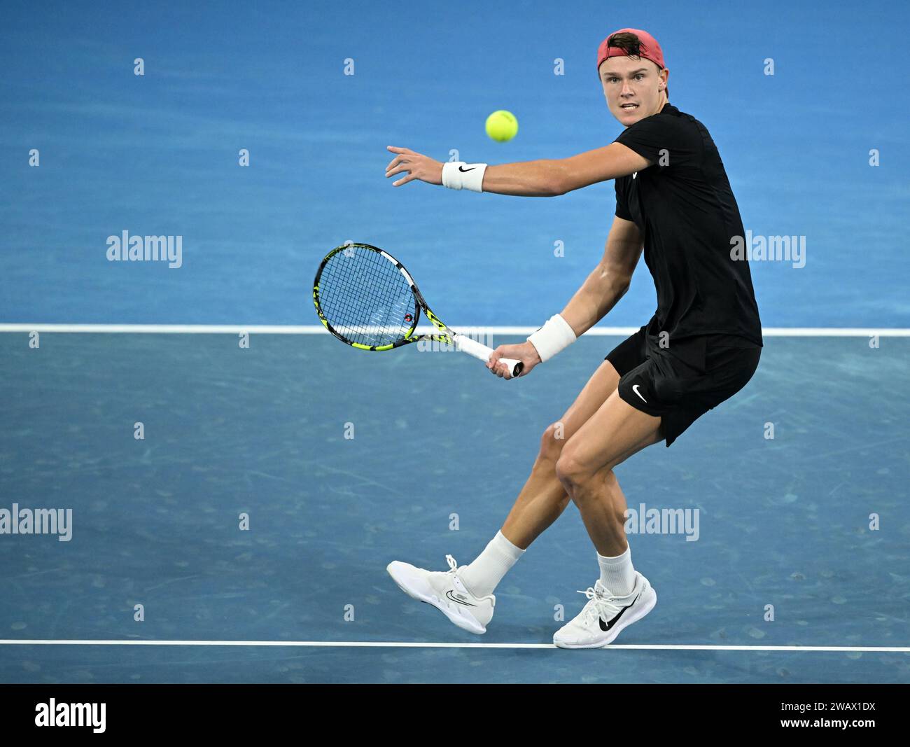 Brisbane, Australia. 07th Jan, 2024. Holger Rune of Denmark in action against Grigor Dimitrov of ...