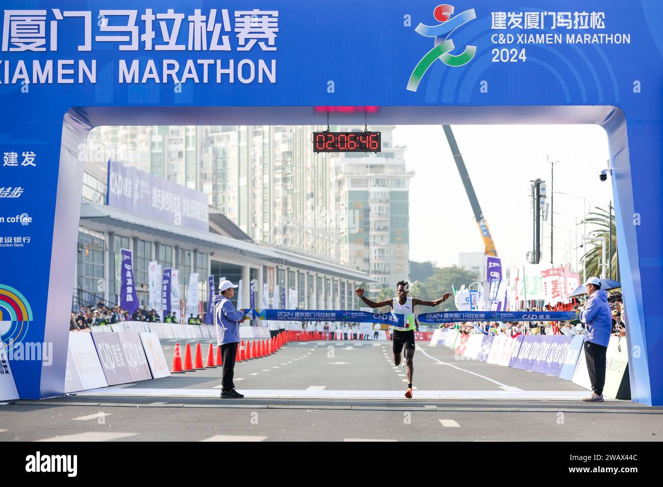 Xiamen. 7th Jan, 2024. Asefa Boki Kebebe of Ethiopia crosses the finish ...