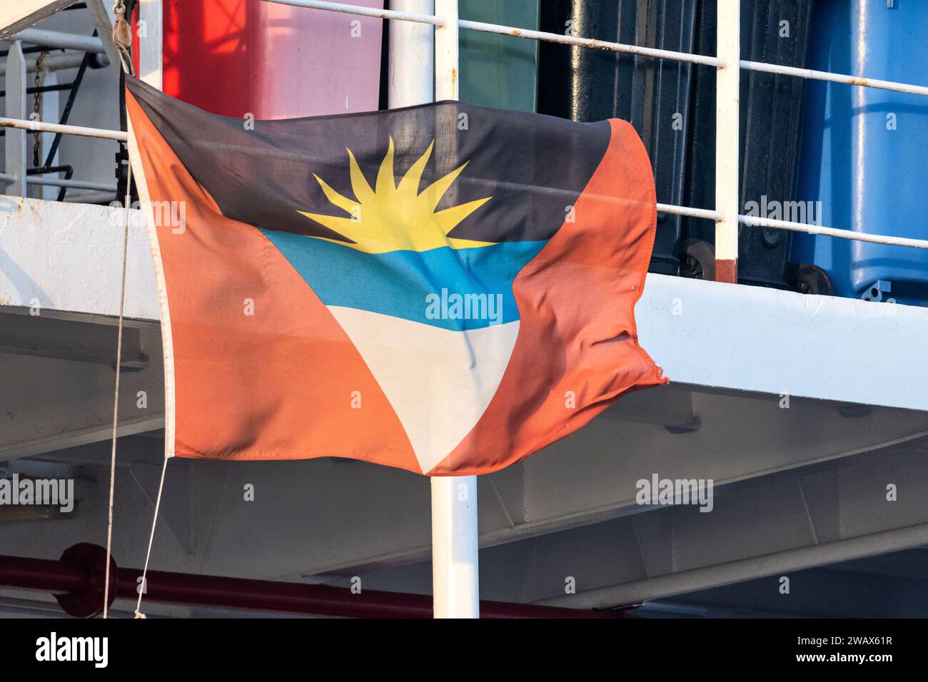 Antigua and Barbuda flag on the stern of a ship Stock Photo - Alamy