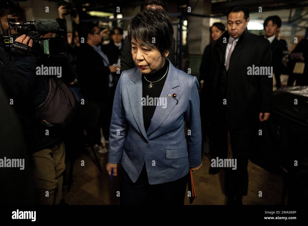 Japan's Foreign Minister Yoko Kamikawa walks along a corridor of a bomb ...