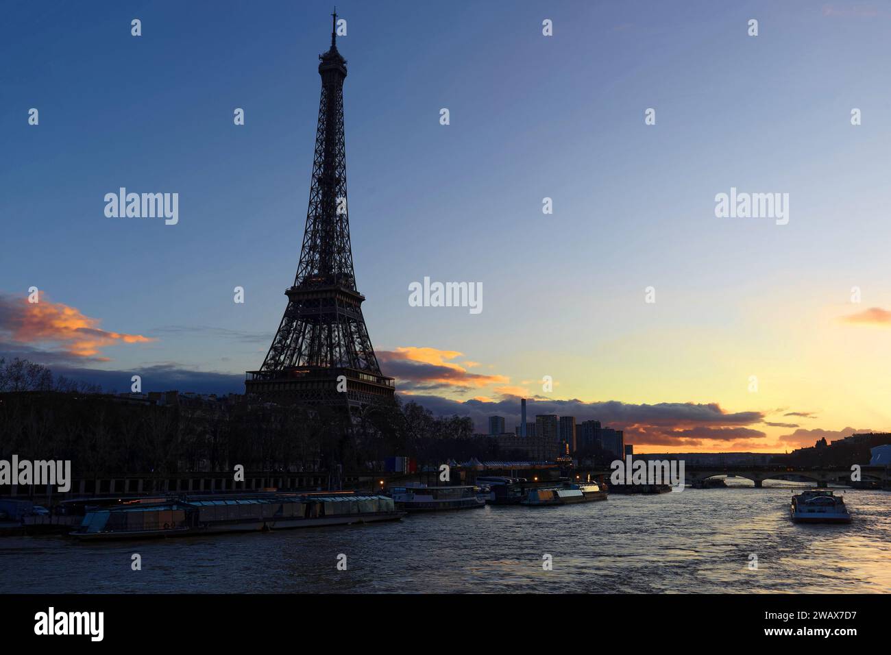 View of Eiffel Tower and river Seine at sunset in Paris. Eiffel Tower ...