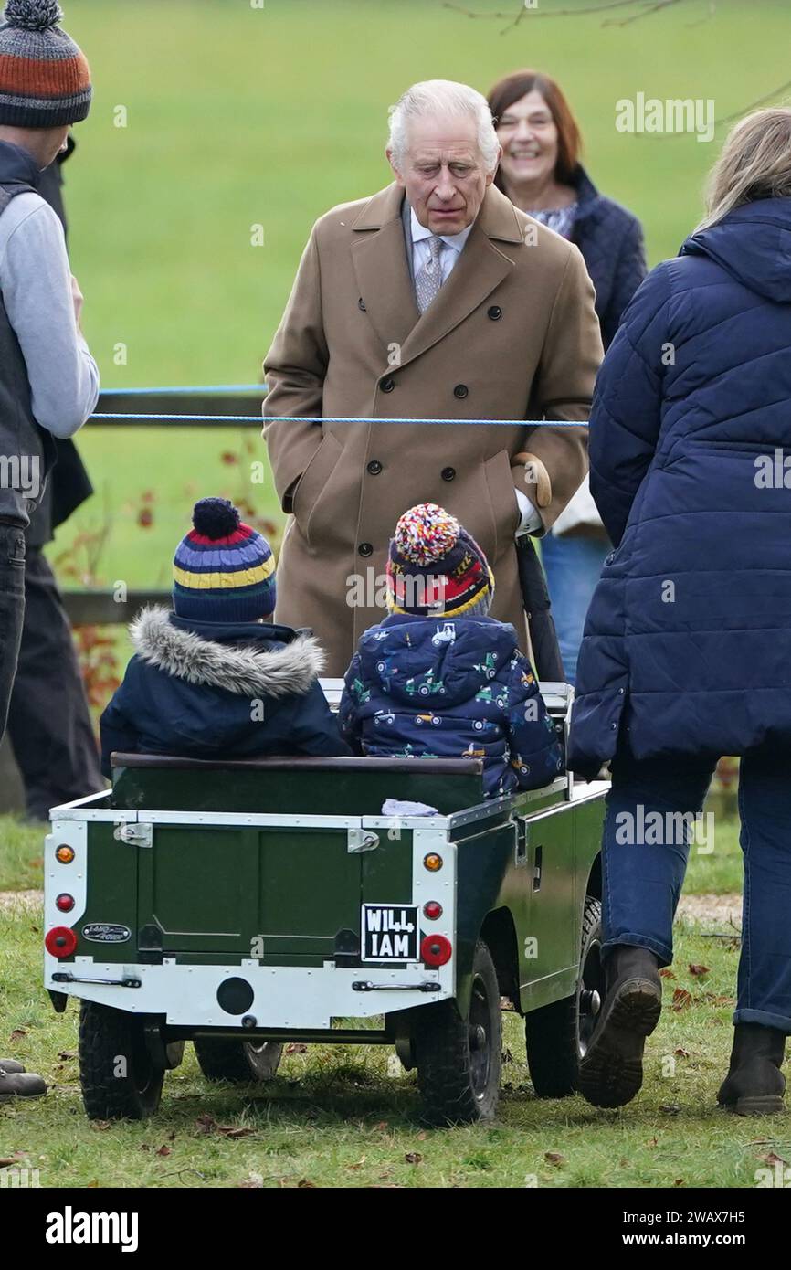 King Charles III talks to Simon and Georgina Ward and their sons ...