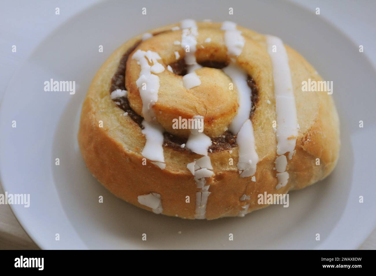 Copenhagen, Denmark /07 January 2024/. Single danish kringle cake and ...