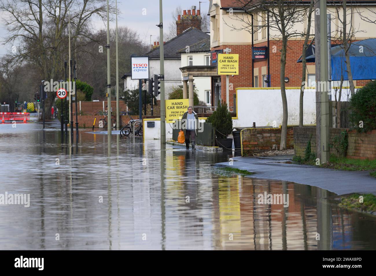 Wadding through floodwater hi-res stock photography and images - Alamy