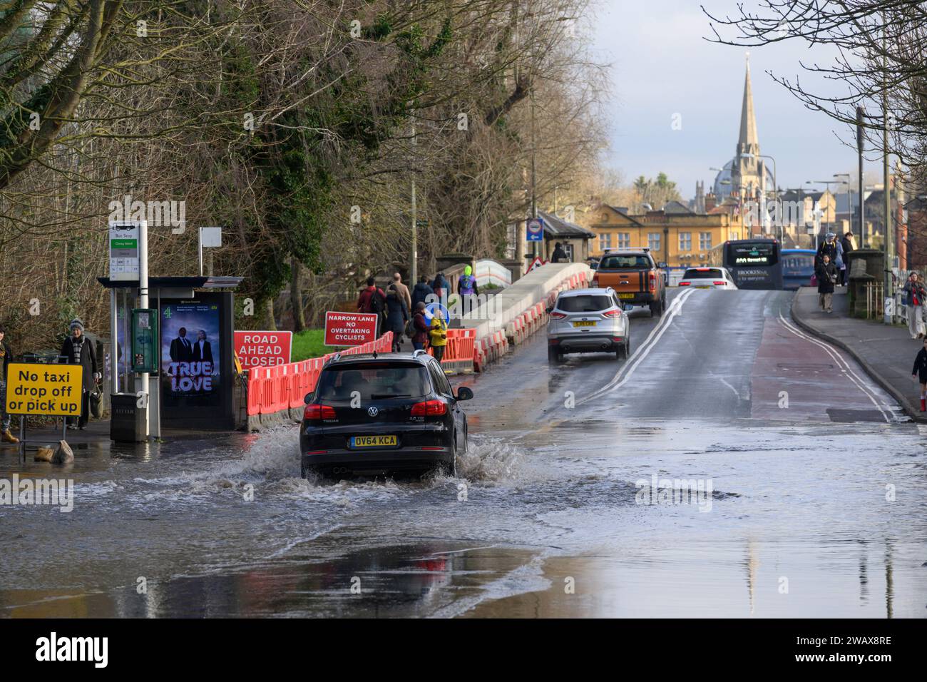 A car driving through floodwater on Botley Road, Oxford, Oxfordshire ...