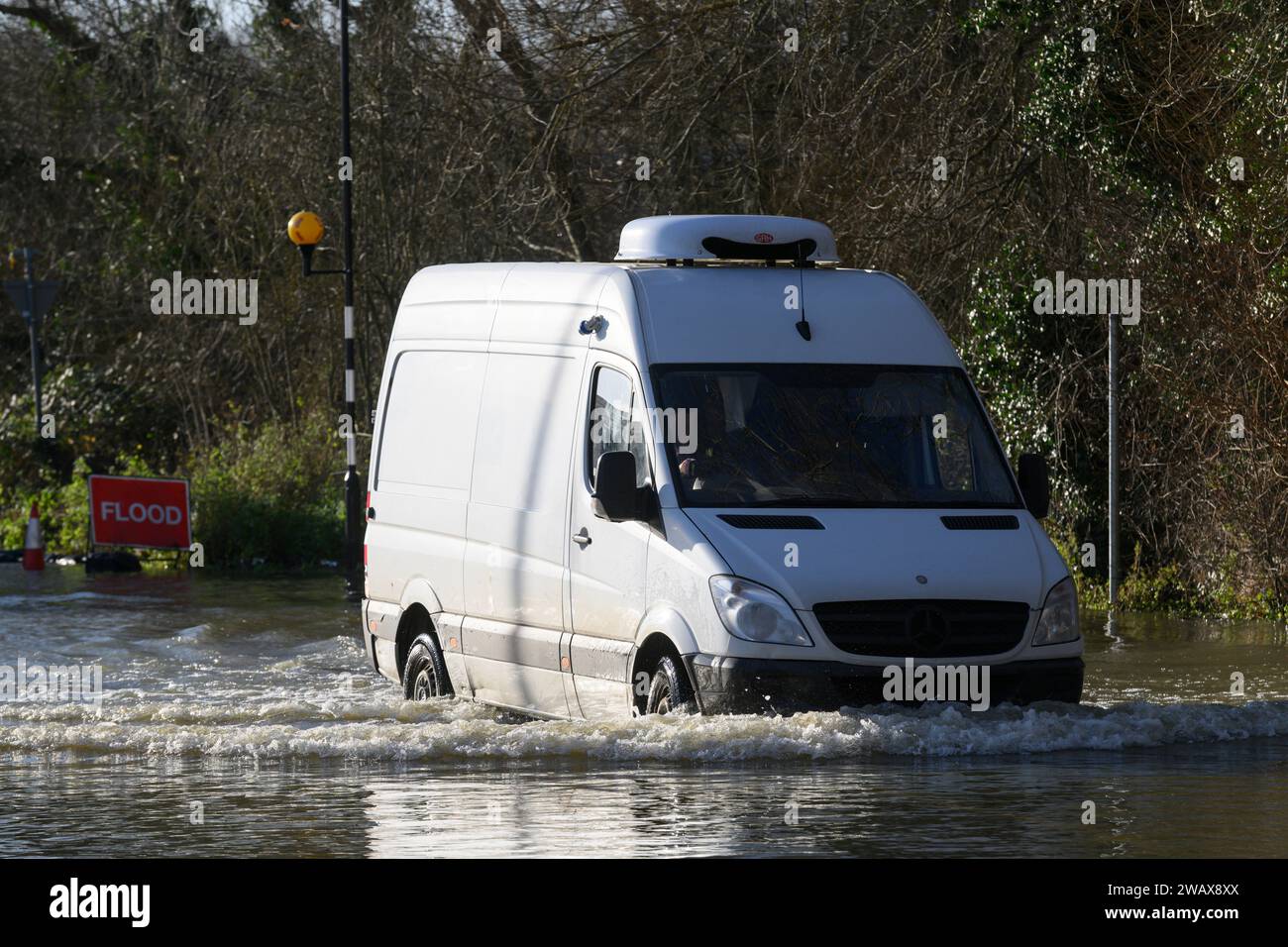 A van, driving through floodwater on Ferry Hinksey Road, Oxford ...