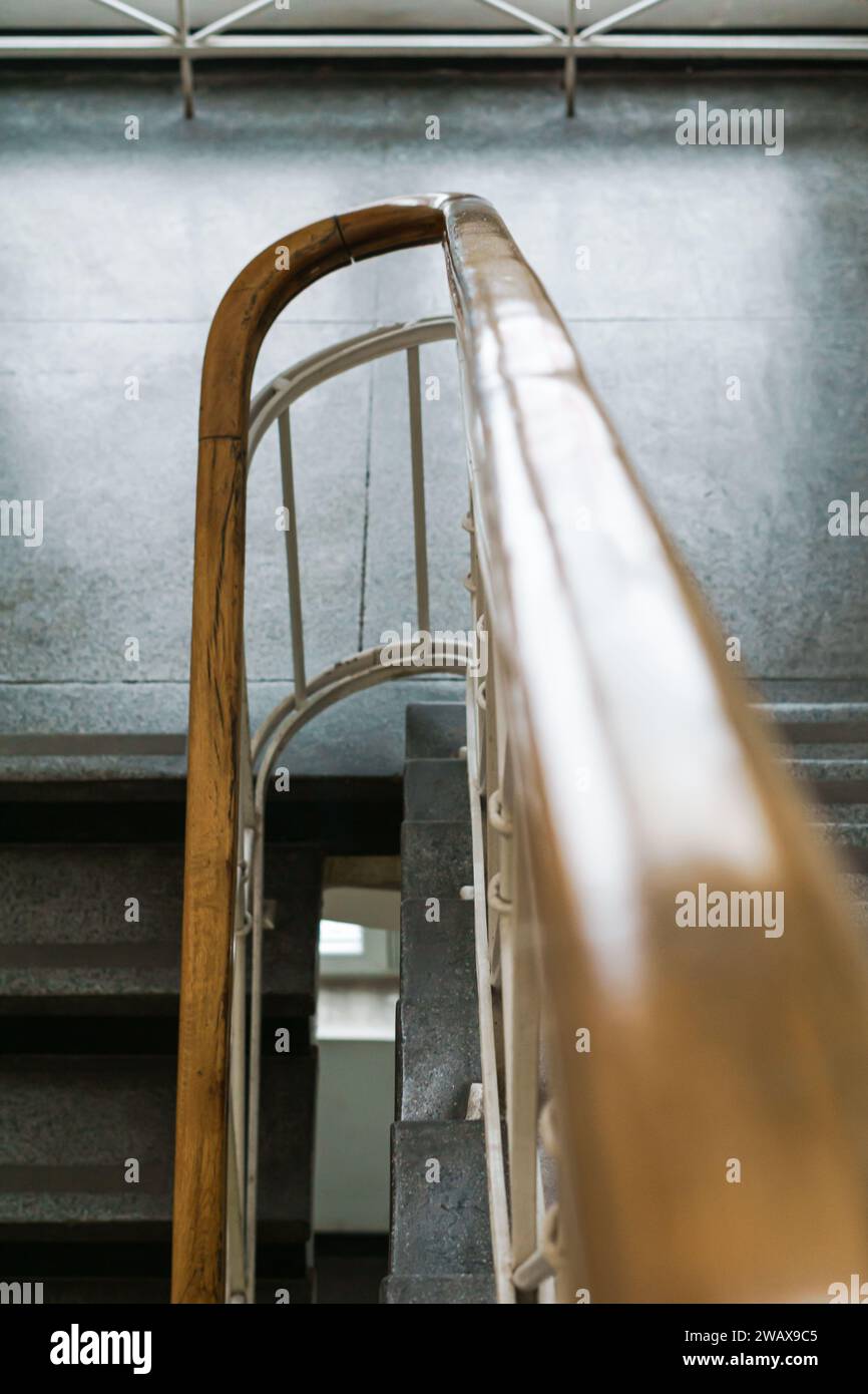 Handrail and stairs in a classic industrial building Stock Photo - Alamy