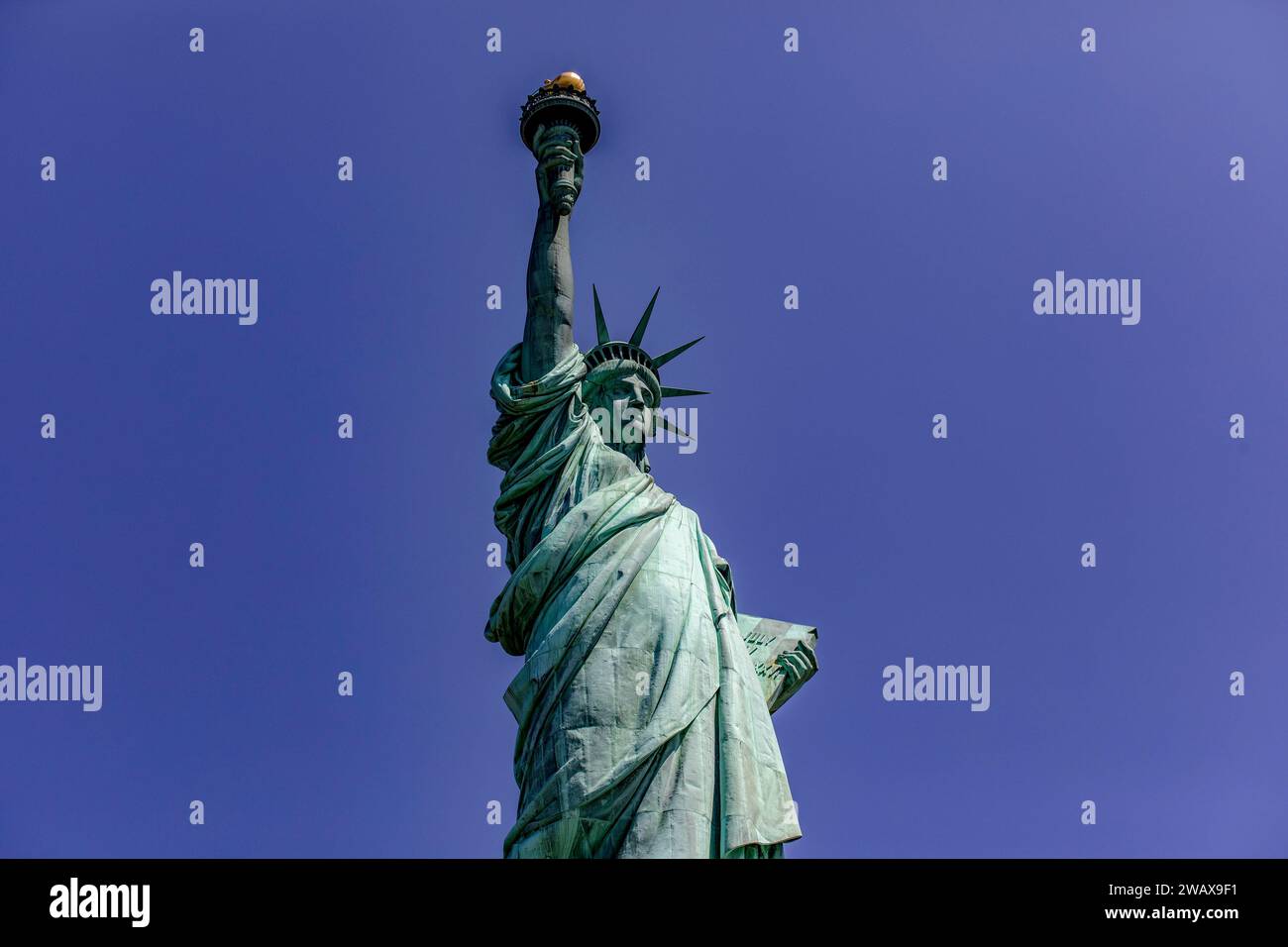 The Statue of Liberty with her crown holding her torch, democratic ...