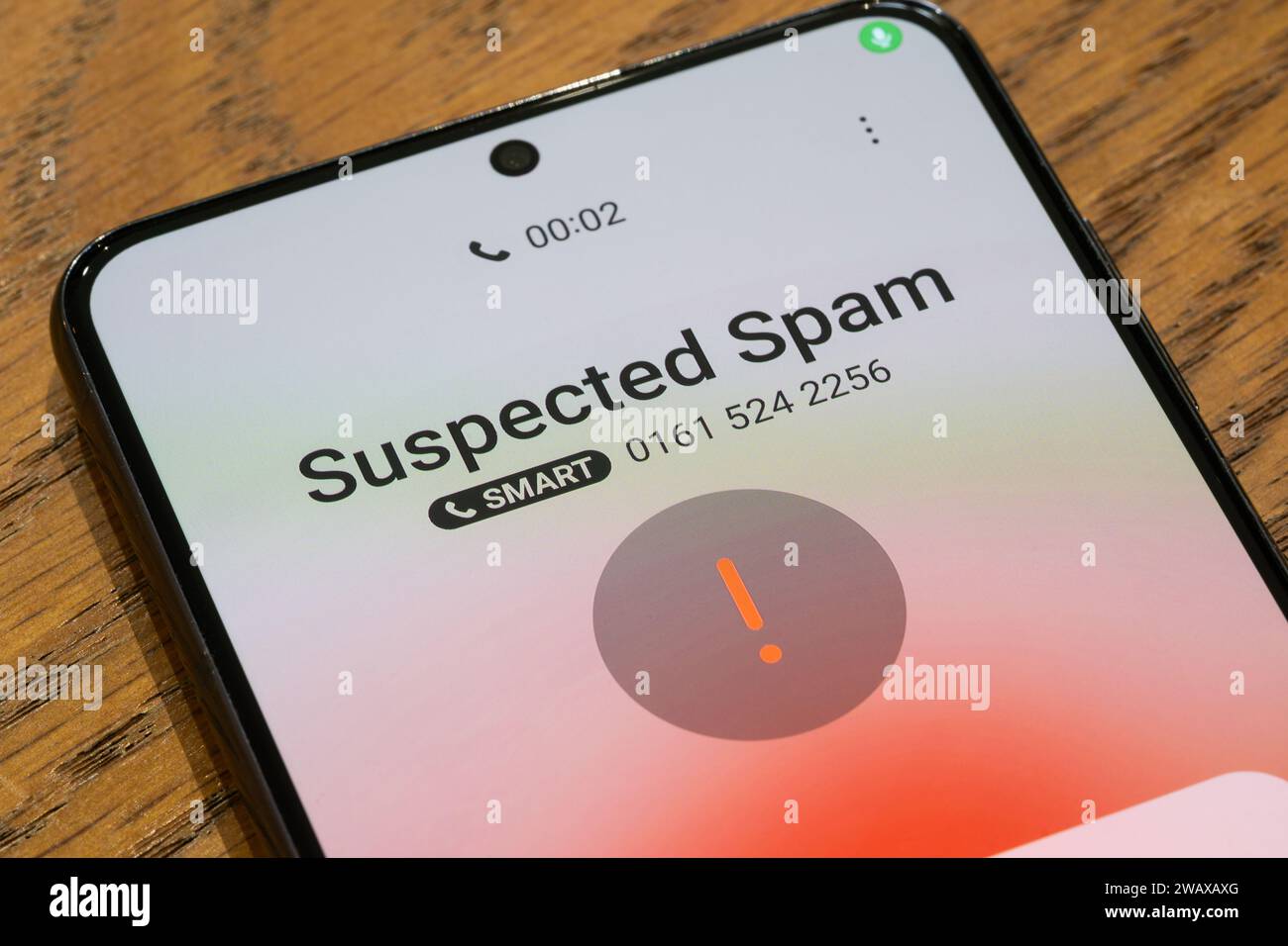 A smartphone screen showing an incoming suspected spam call, UK. Theme ... A smartphone screen showing an incoming suspected spam call, UK. Theme ...
