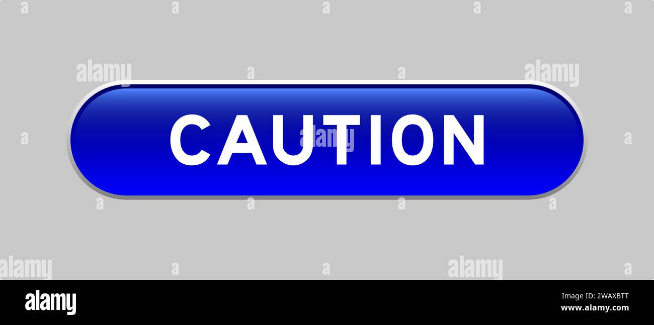 Blue color capsule shape button with word caution on gray background ...
