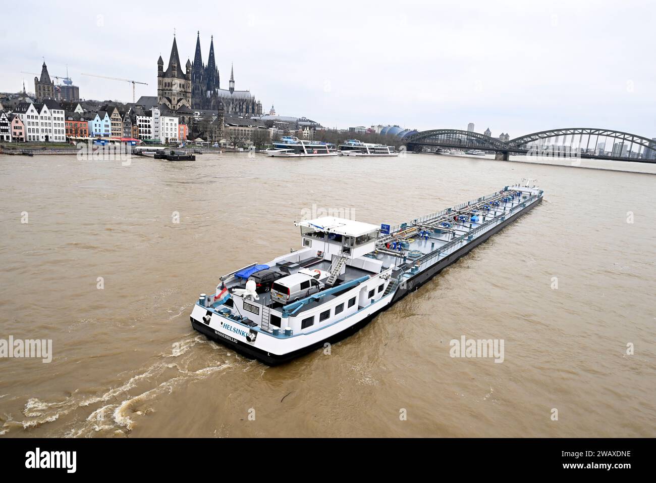 Cologne, Germany. 07th Jan, 2024. A ship passes Cologne Cathedral on ...