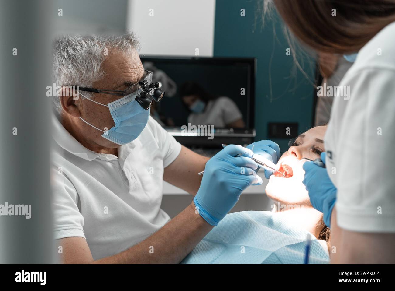 With the help of high-tech equipment and expert skills, the doctor and ...