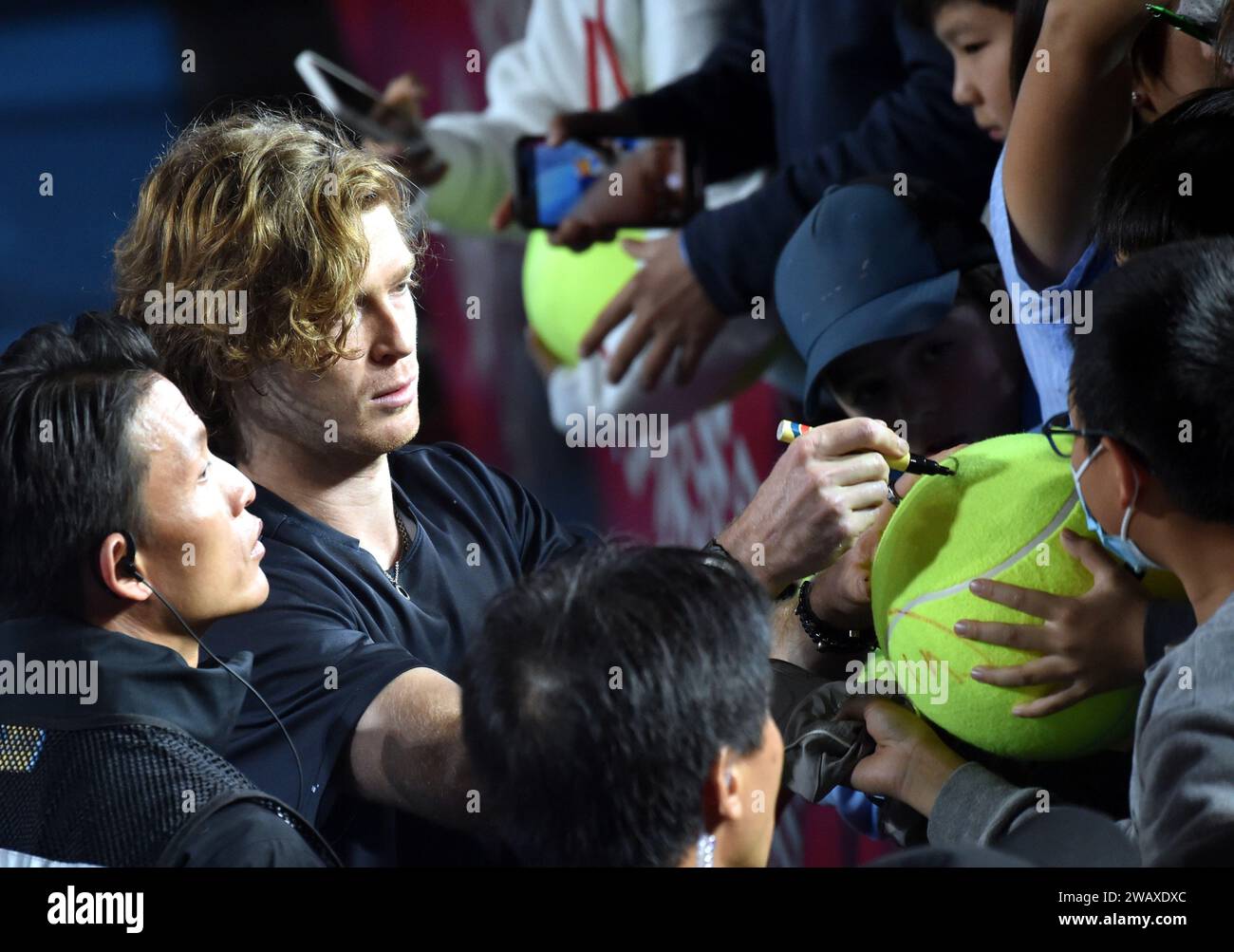 Hong Kong, South China. 7th Jan, 2024. Andrey Rublev signs an autograph for a fan after the men ...