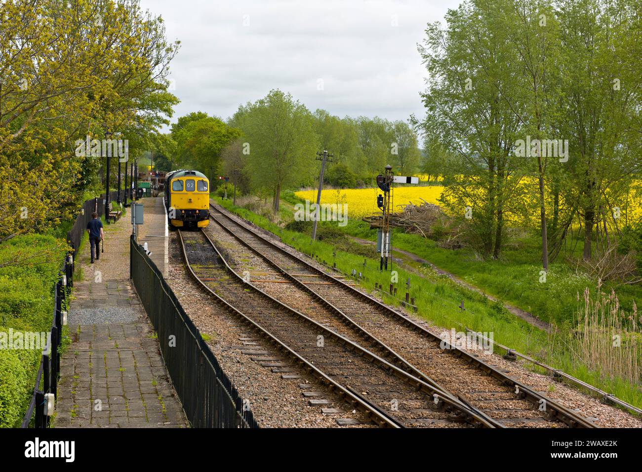 A train headed by Class 33/2 33202 passes Wittersham Road station on ...