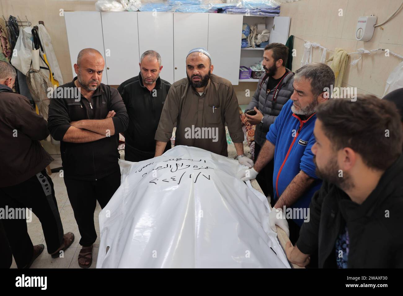 Palestinians attend in the funeral of Hamza Wael Dahdouh, a journalist ...