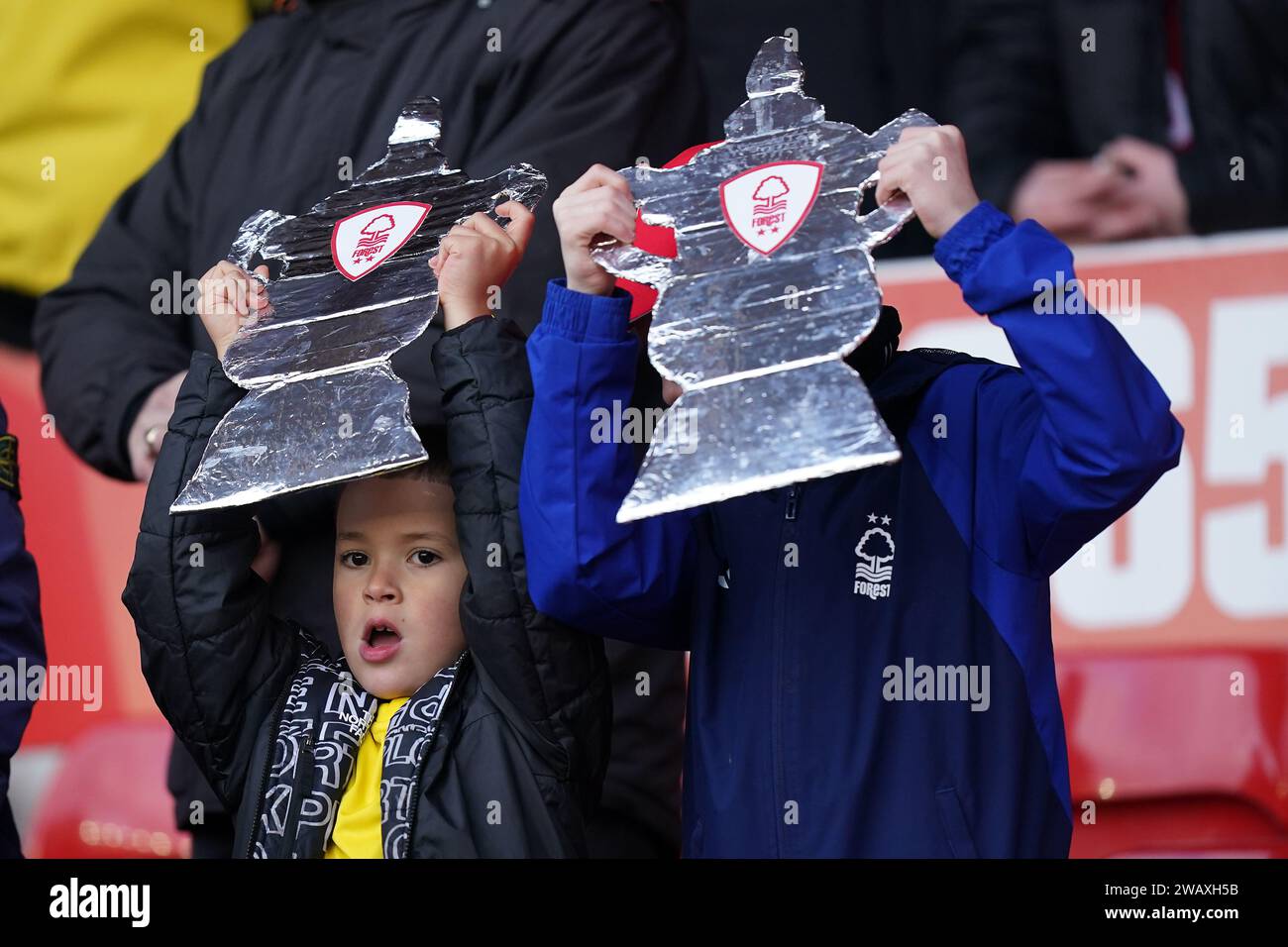 Fans with foil FA cup trophy replicas during the Emirates FA Cup Third ...