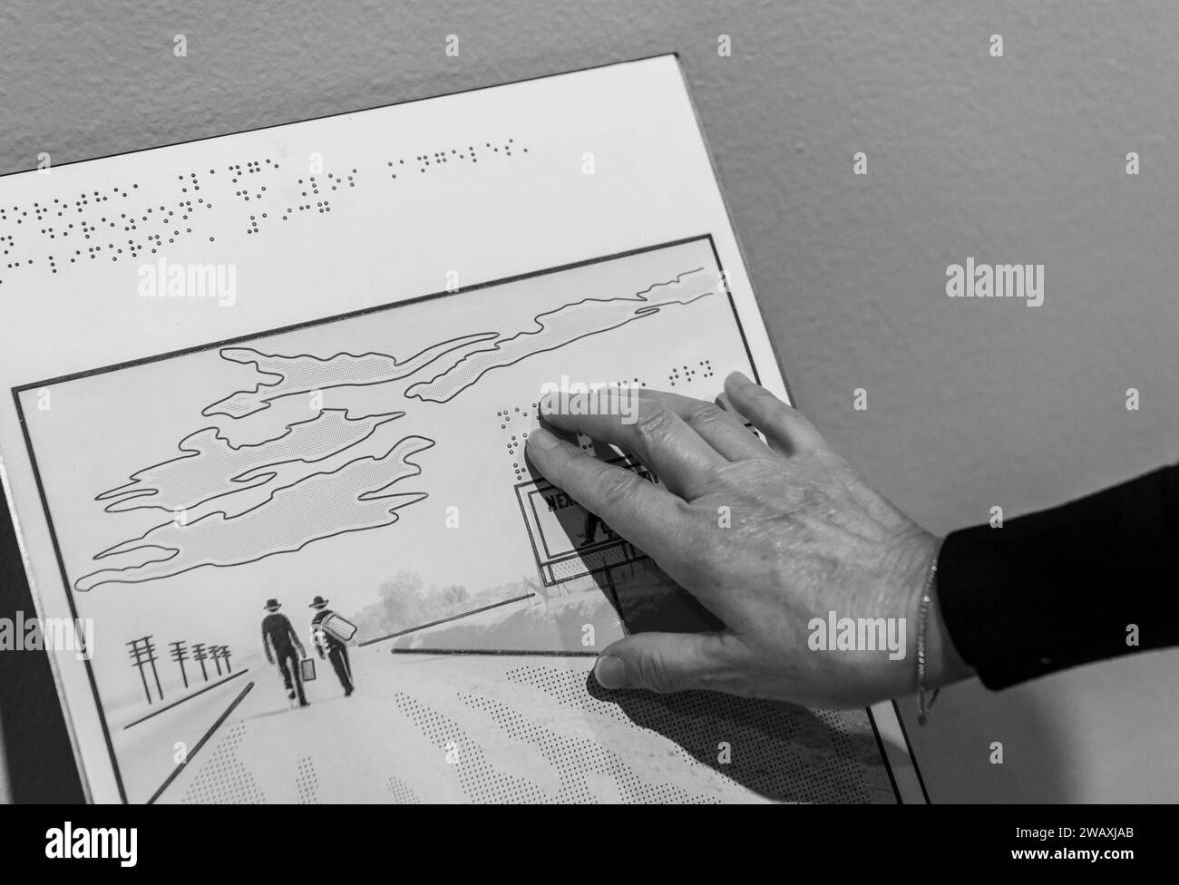 blind reading text caption and photograph in braille language at the ...