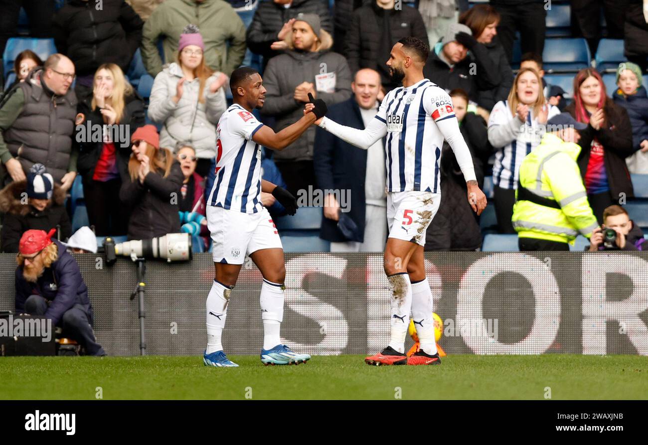 West Bromwich Albion's Jovan Malcolm (left) celebrates scoring their ...