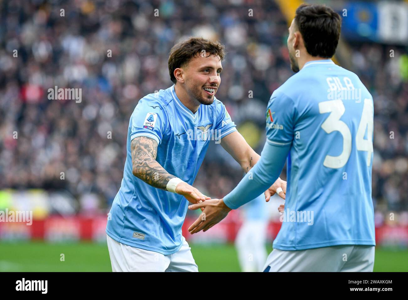Udine, Italy. 07th Jan, 2024. Lazio's Luca Pellegrini celebrates after ...
