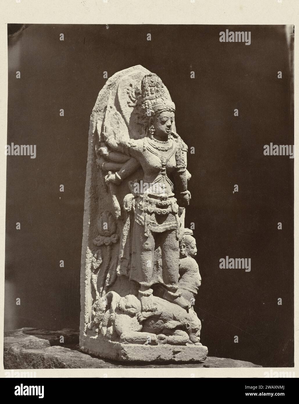 Ten armed Durga slaying the demon Mahisha, upper right arm missing ...