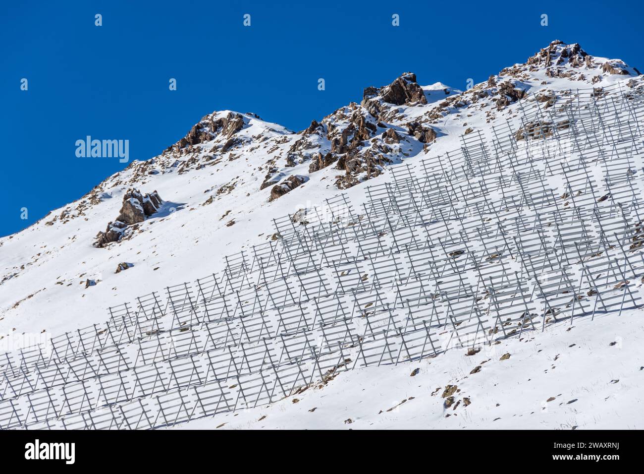 Avalanche protection barriers on a snowy slope Stock Photo - Alamy